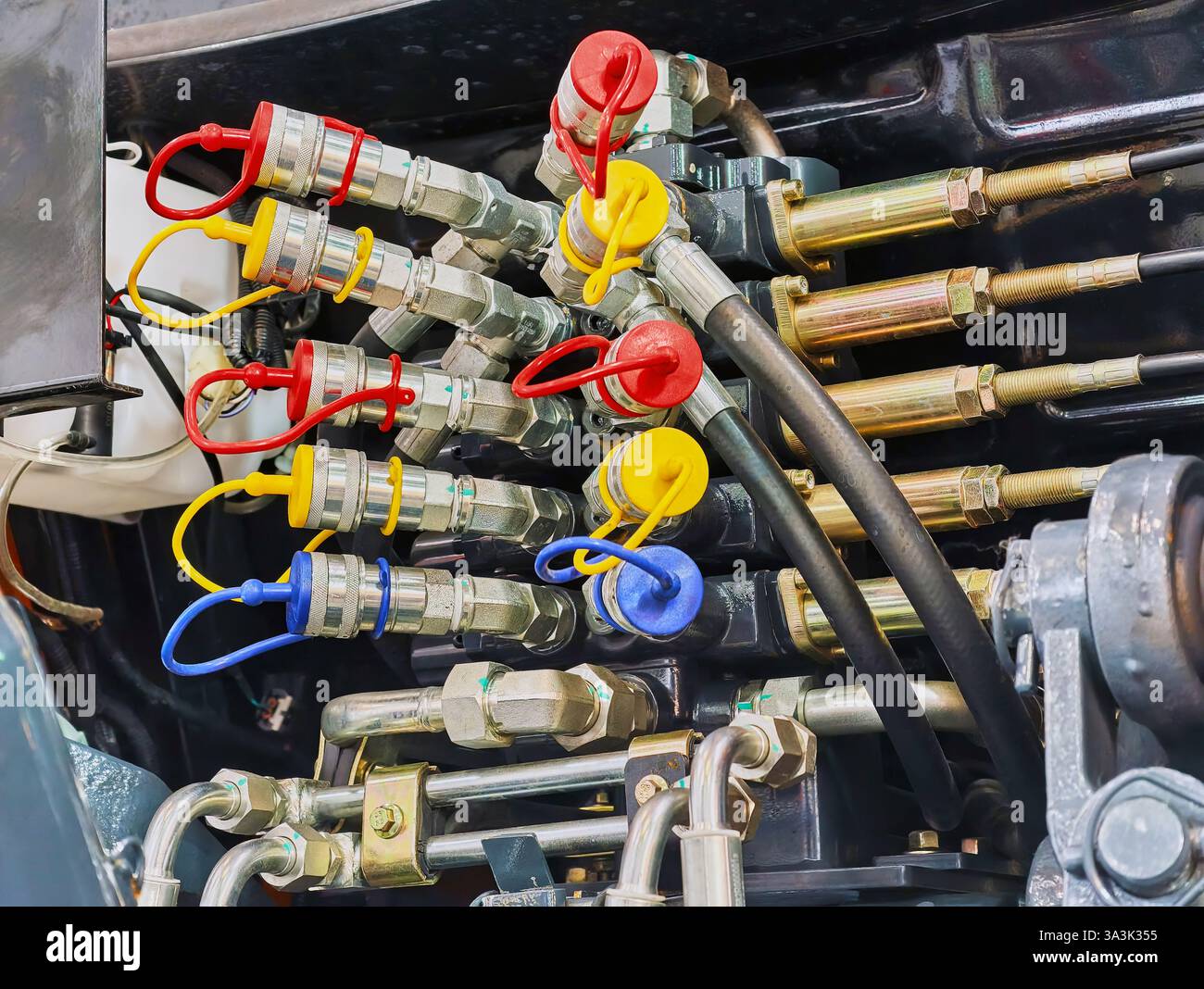 Hydraulic connectors and hoses showcasing vibrant colors and intricate ...