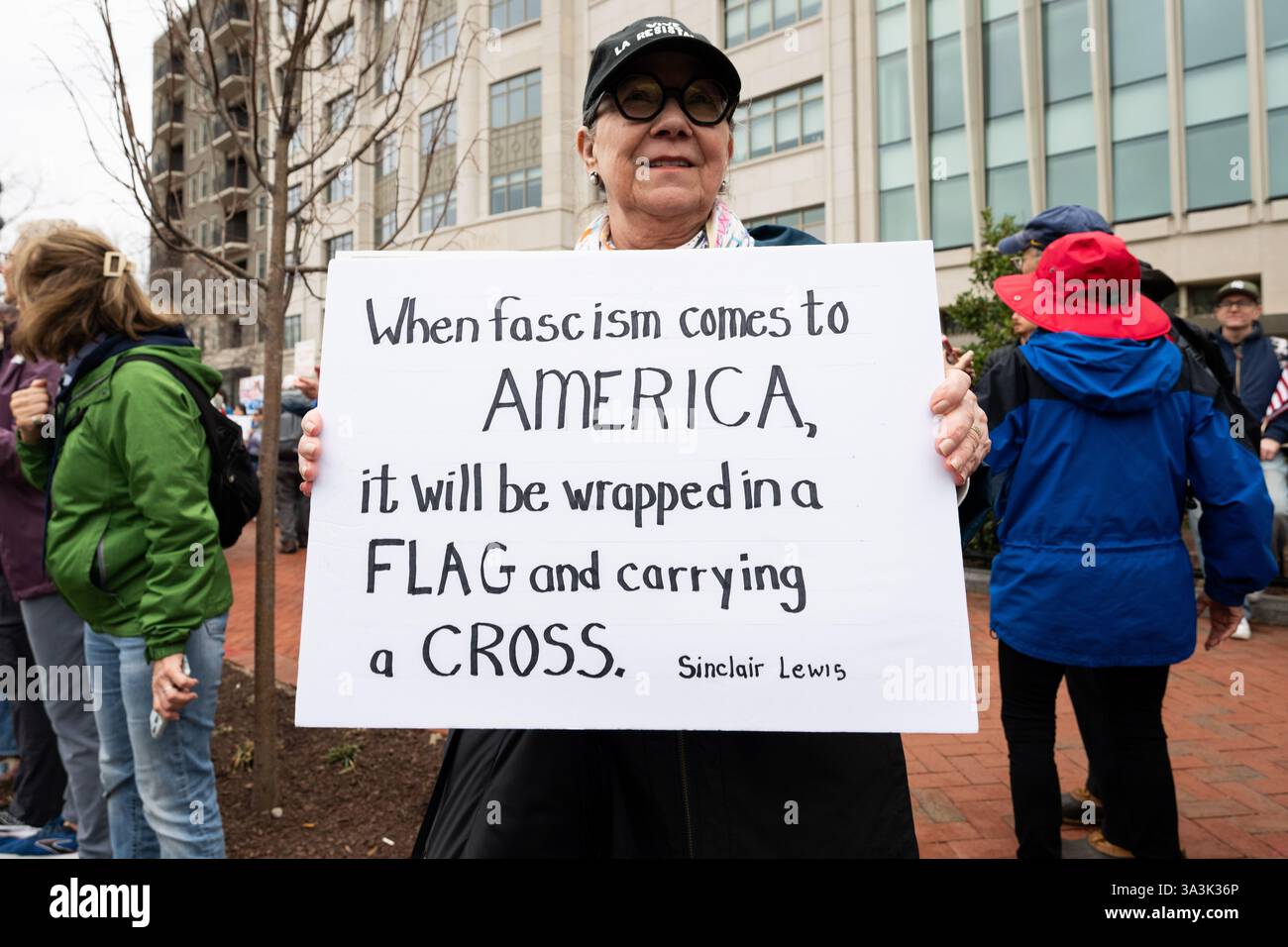 Washington, United States. 16th Mar, 2025. Person with a sign saying ...