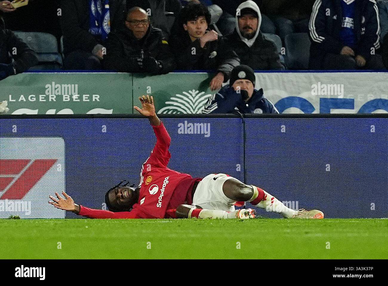 Manchester United's Ayden Heaven goes down injured during the Premier ...