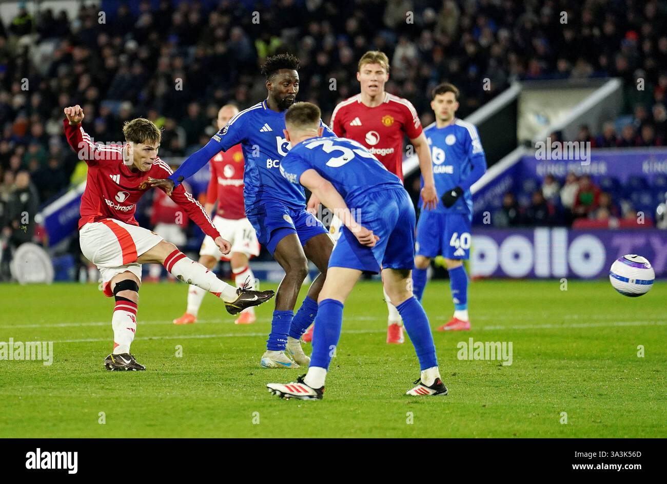 Manchester United's Alejandro Garnacho (left) scores their side's ...