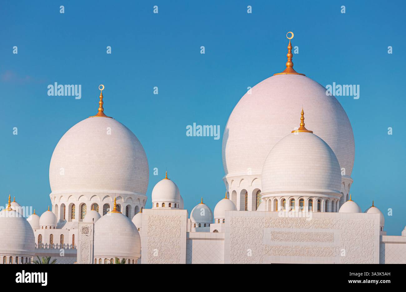 Majestic domes of Sheikh Zayed Mosque in Abu Dhabi create a ...