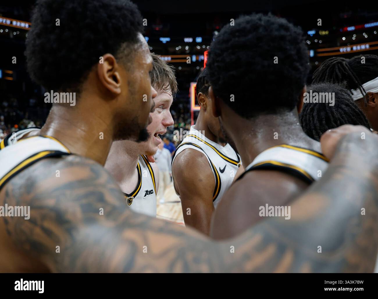 March 16, 2025: VCU Rams Guard (11) Max Shulga huddles up with his ...
