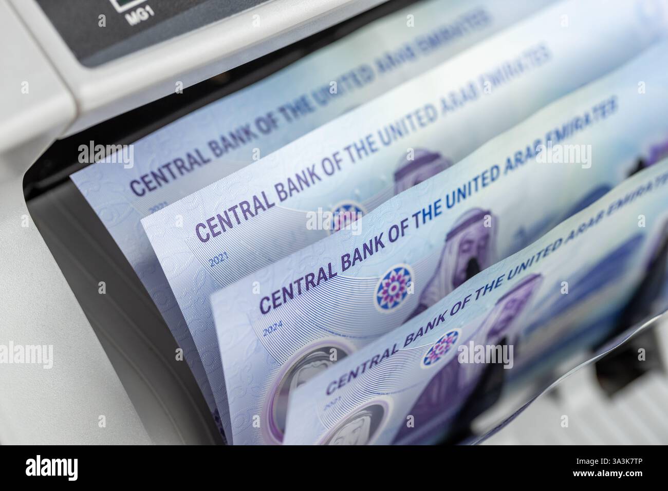 UAE money, Counting machine Emirates banknotes of 50 dirhams. Financial ...