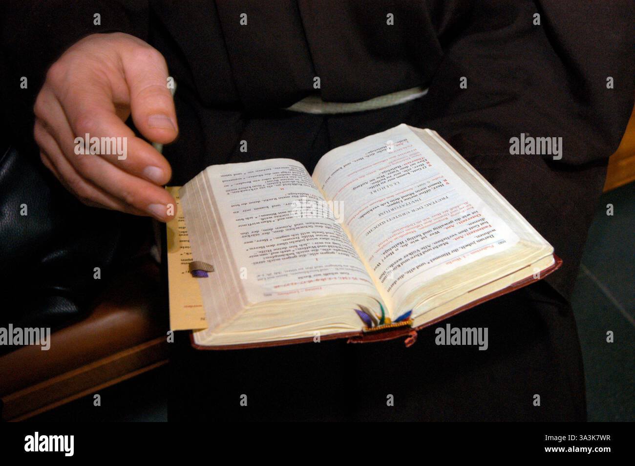 a Catholic Priest with Breviary or the Book of Hours Catholic Priest ...