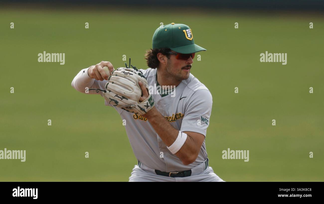 San Francisco infielder Charles-Etienne Pelletier (8) fields the ball ...