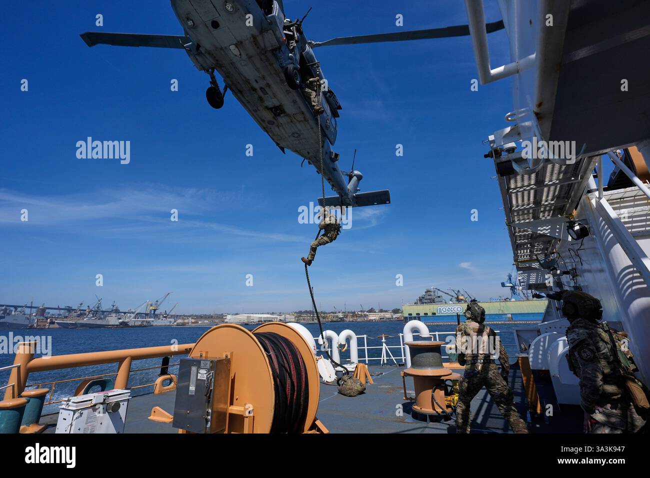 Members of the Maritime Security Response Team participate in a fast ...