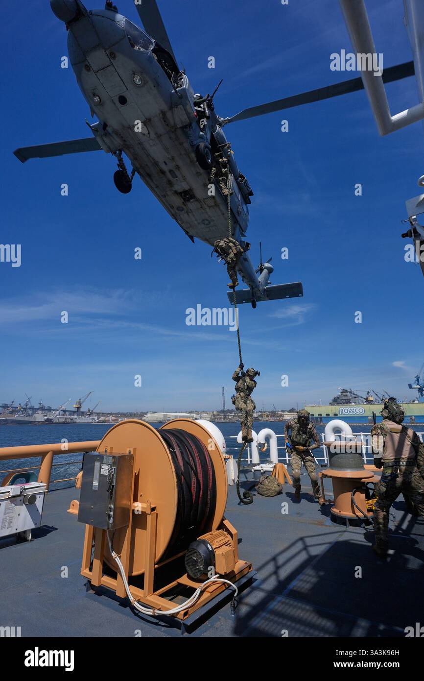 Members of the Maritime Security Response Team participate in a fast ...