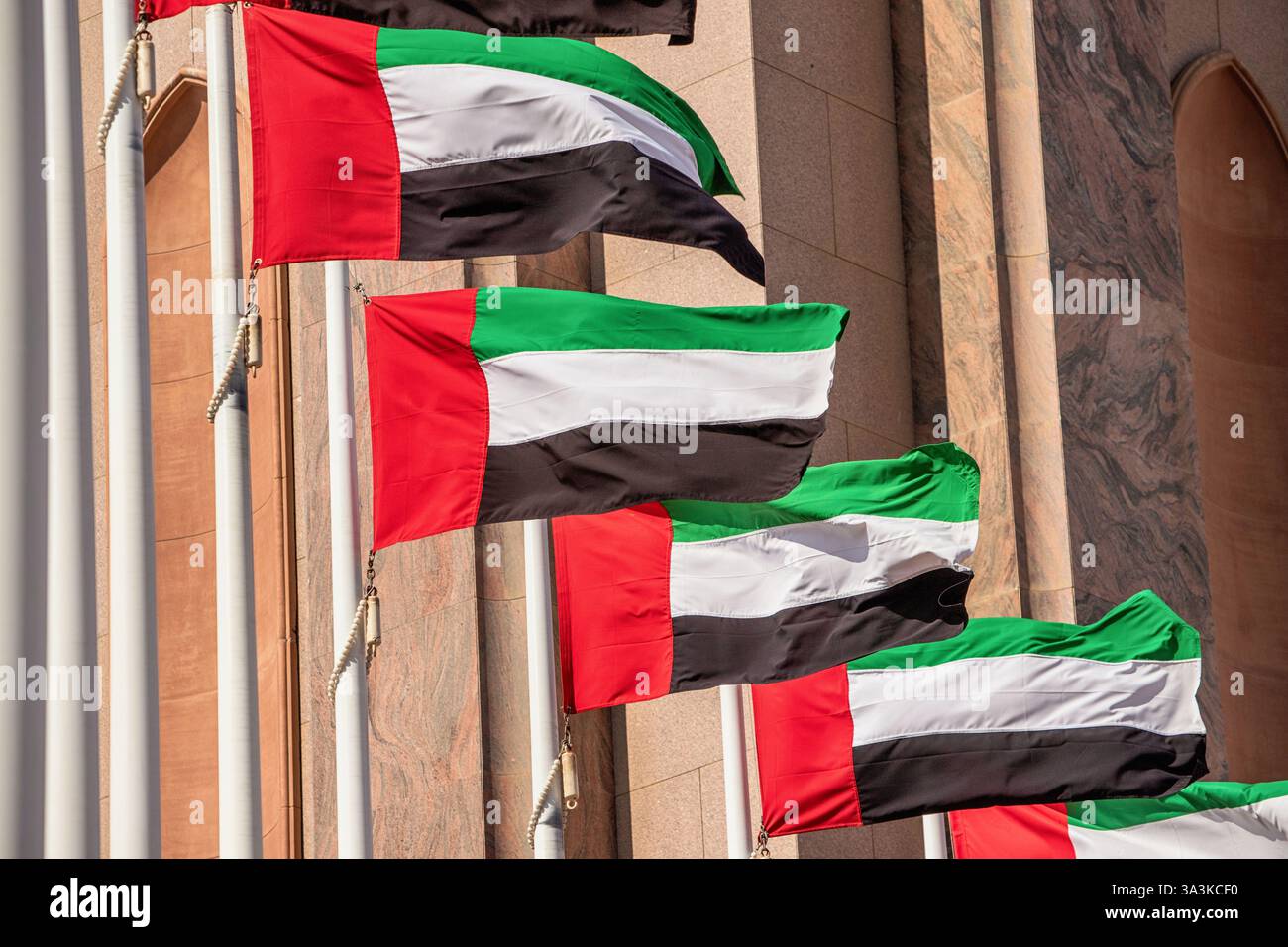 Multiple UAE flags waving proudly on tall poles, symbolizing national ...