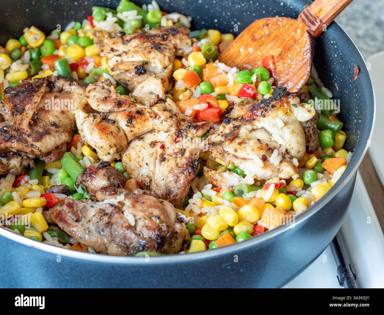 Mixed vegetables rice in pan hi-res stock photography and images - Alamy