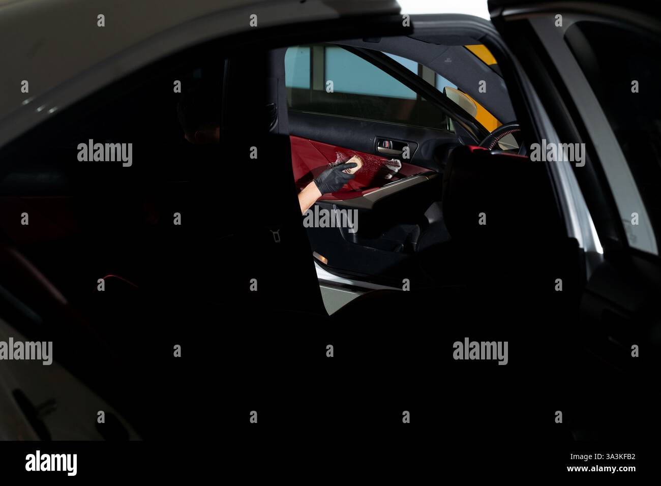 Process of restoration car door plastic. Brushing car door panel ...