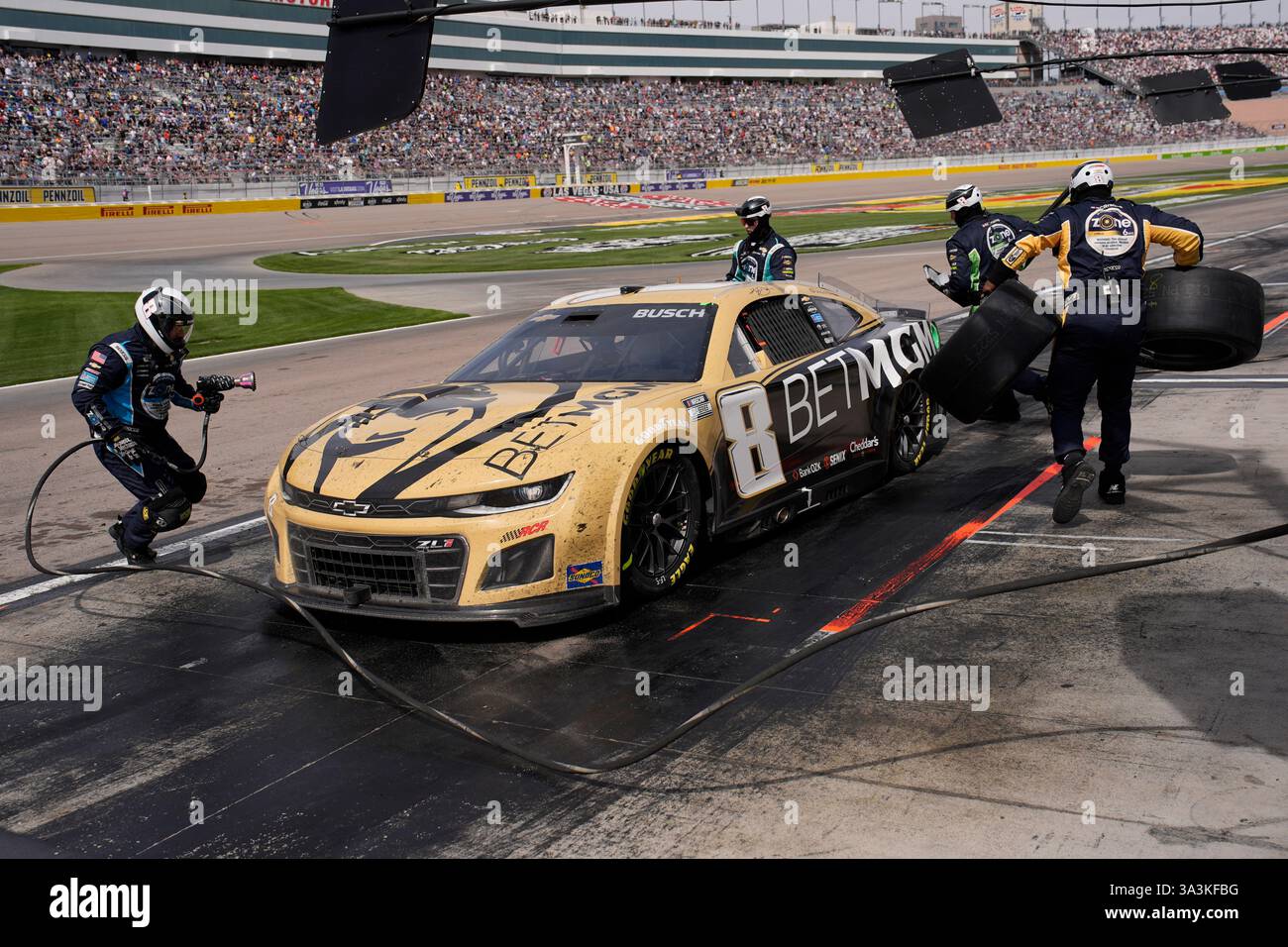 Kyle Busch makes a pit stop during a NASCAR Cup Series auto race Sunday ...