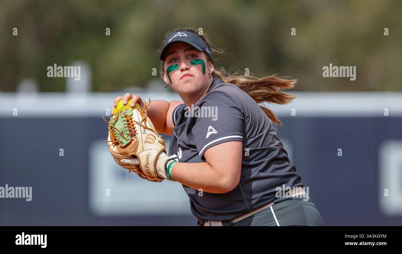 Jacksonville pitcher Christa Pritchard (34) warms up before an NCAA ...