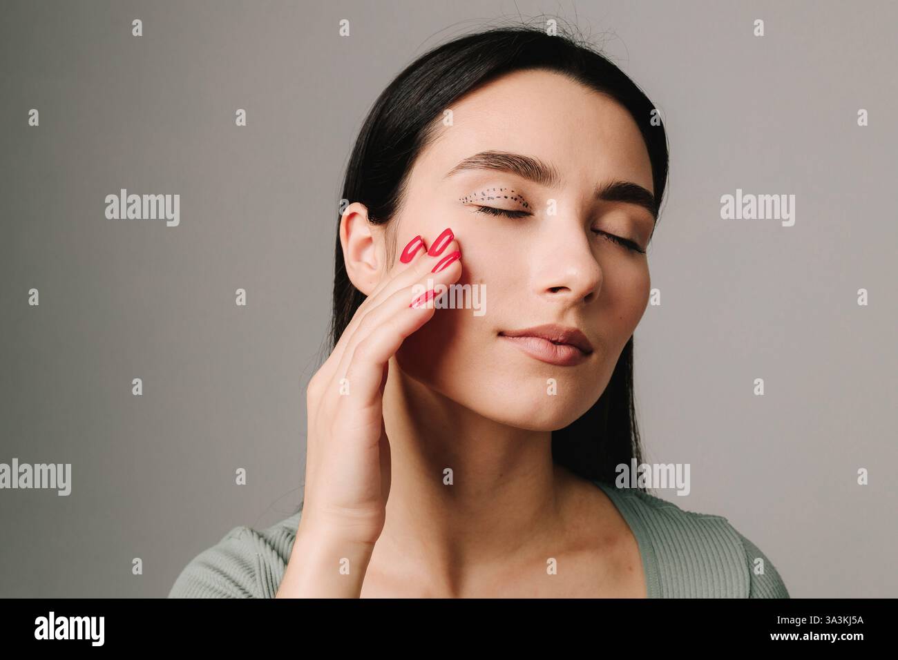 Blepharoplasty markup. Woman is showing well done contour for eye lids ...