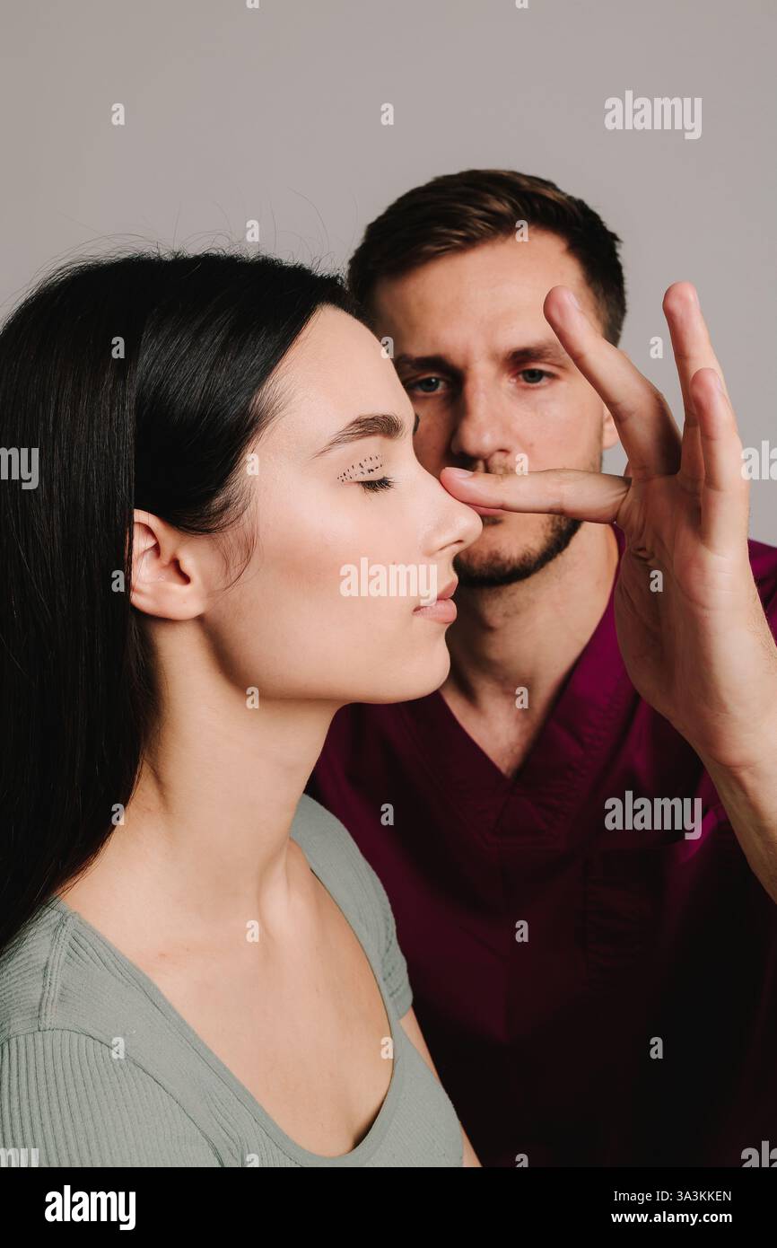 Rhinoplasty. Woman is going through nose surgery to constantly remove ...