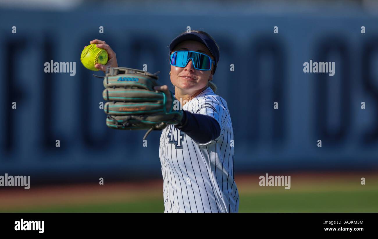 North Florida outfielder Grace Shaw-Rockey (22) warms up before an NCAA ...