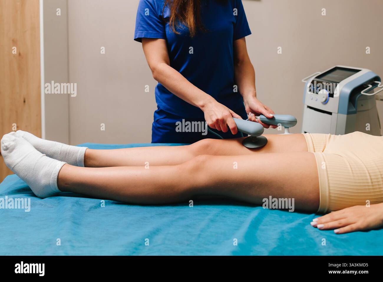 Tecar therapy to help with post surgery rehabilitation. Young athlete ...