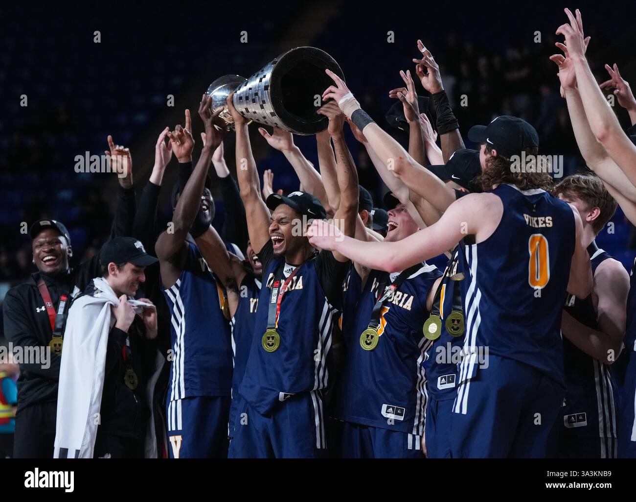 University of Victoria Vikes' Aaron Tesfagiorgis, front left, and his ...