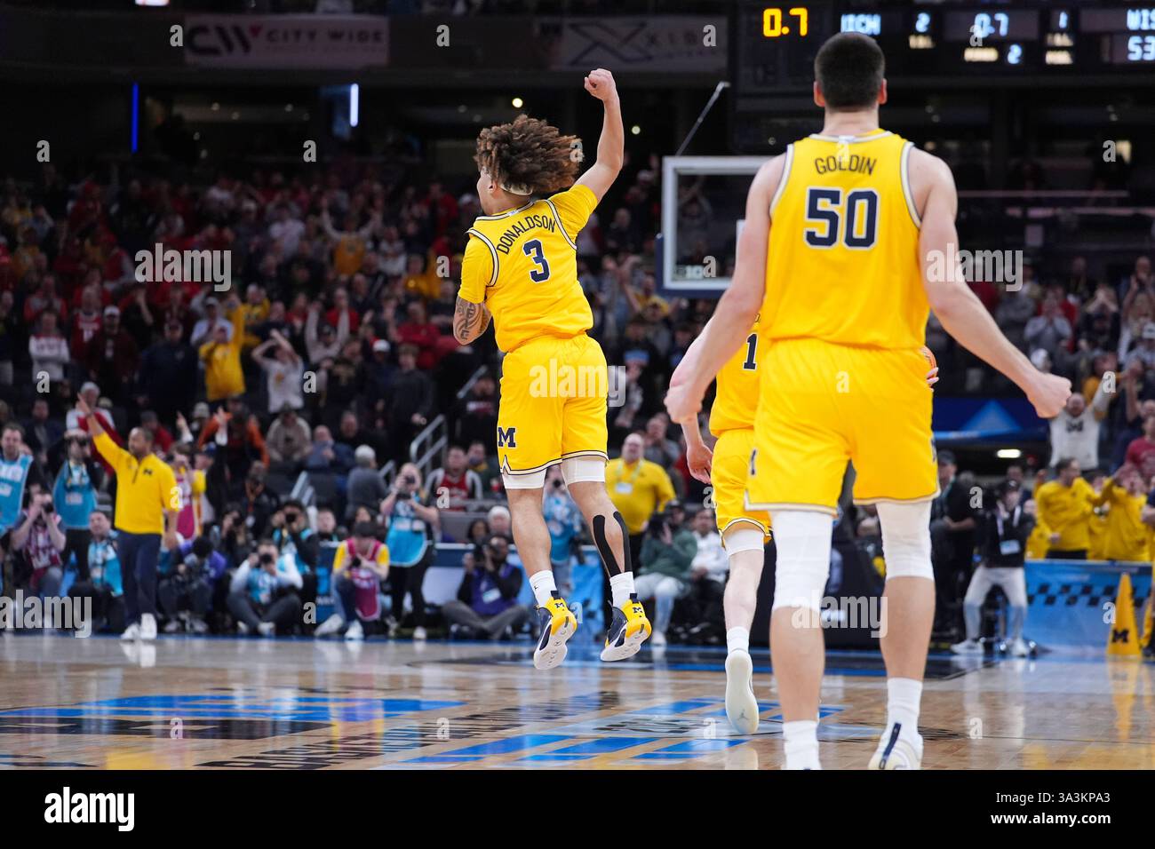 Michigan guard Tre Donaldson (3) reacts against Wisconsin during the ...