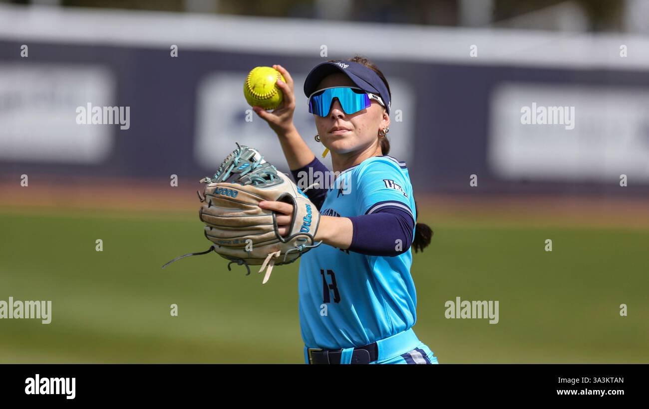 North Florida infielder Logan Turner (13) warms up before an NCAA ...