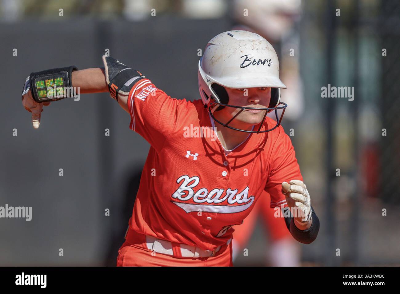Mercer outfielder Laura Vigna (21) runs to first base during an NCAA ...