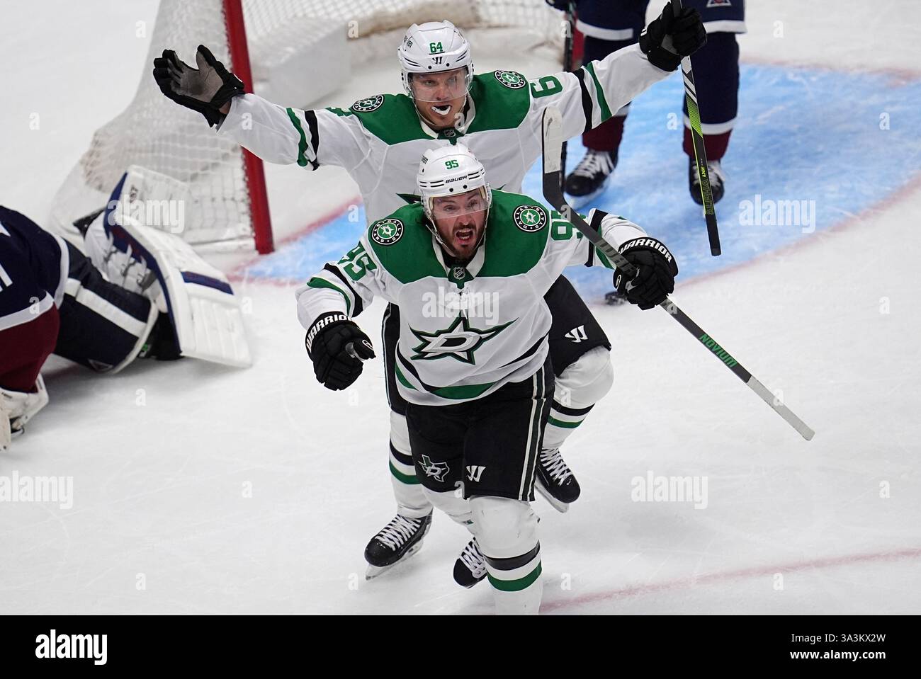 Dallas Stars center Matt Duchene, front, reacts after scoring with ...