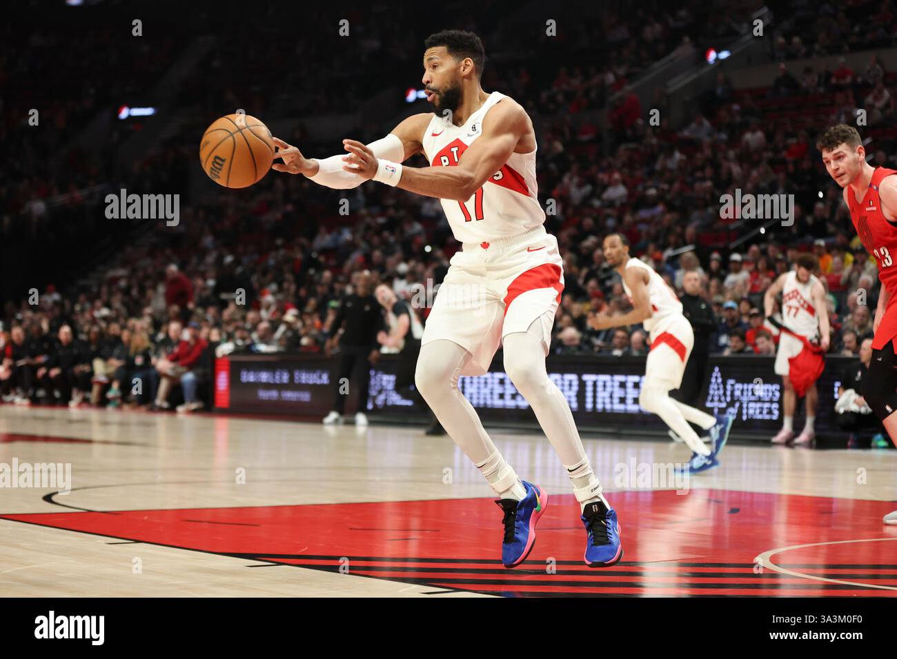 Toronto Raptors forward Garrett Temple (17) passes against the Portland ...