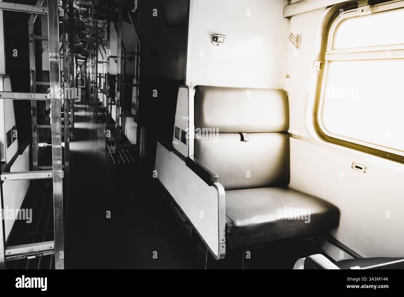 Inside of old public Thai railway train cabin with seats, handrails ...