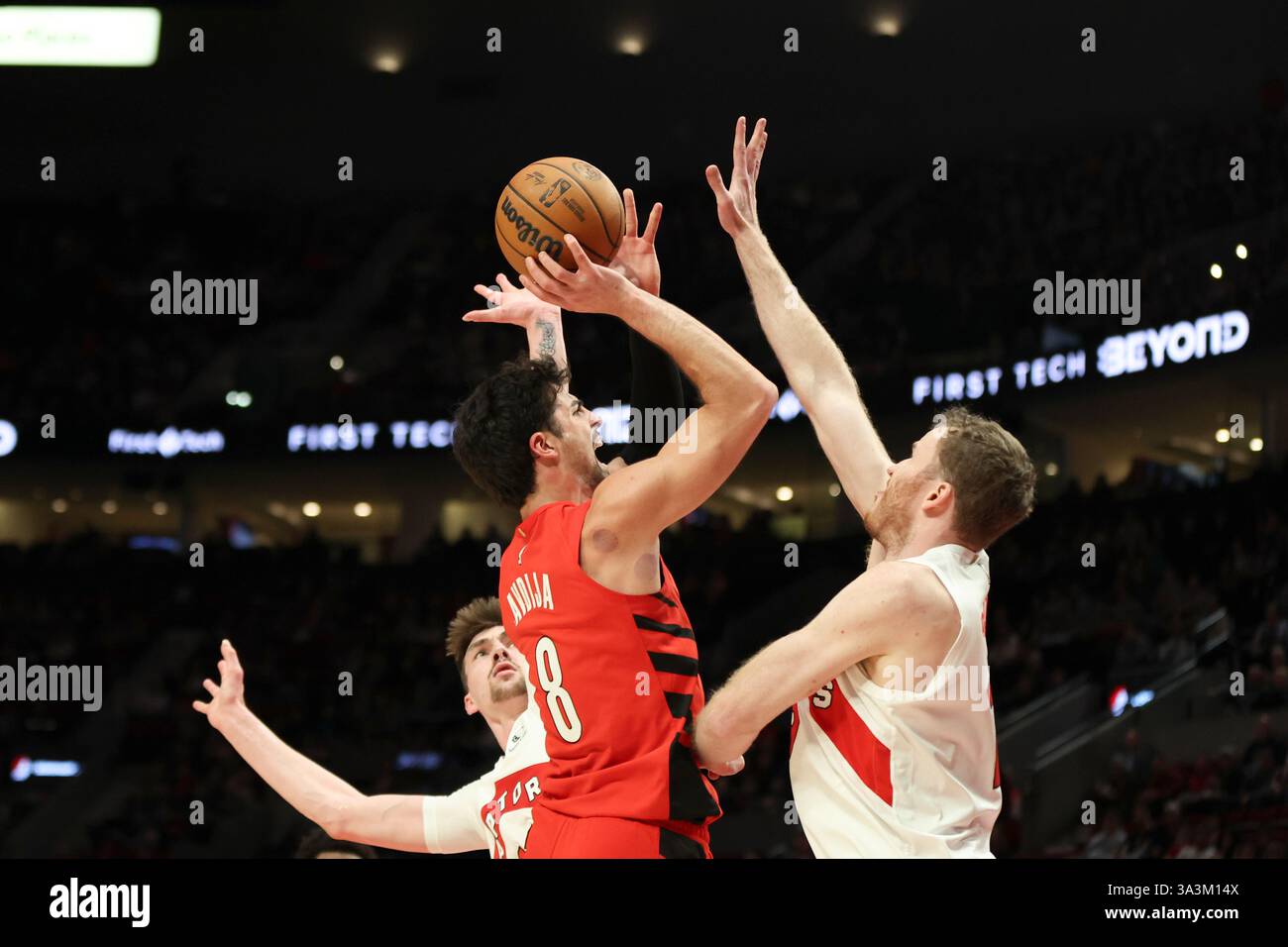 Portland Trail Blazers forward Deni Avdija, center, shoots over Toronto ...