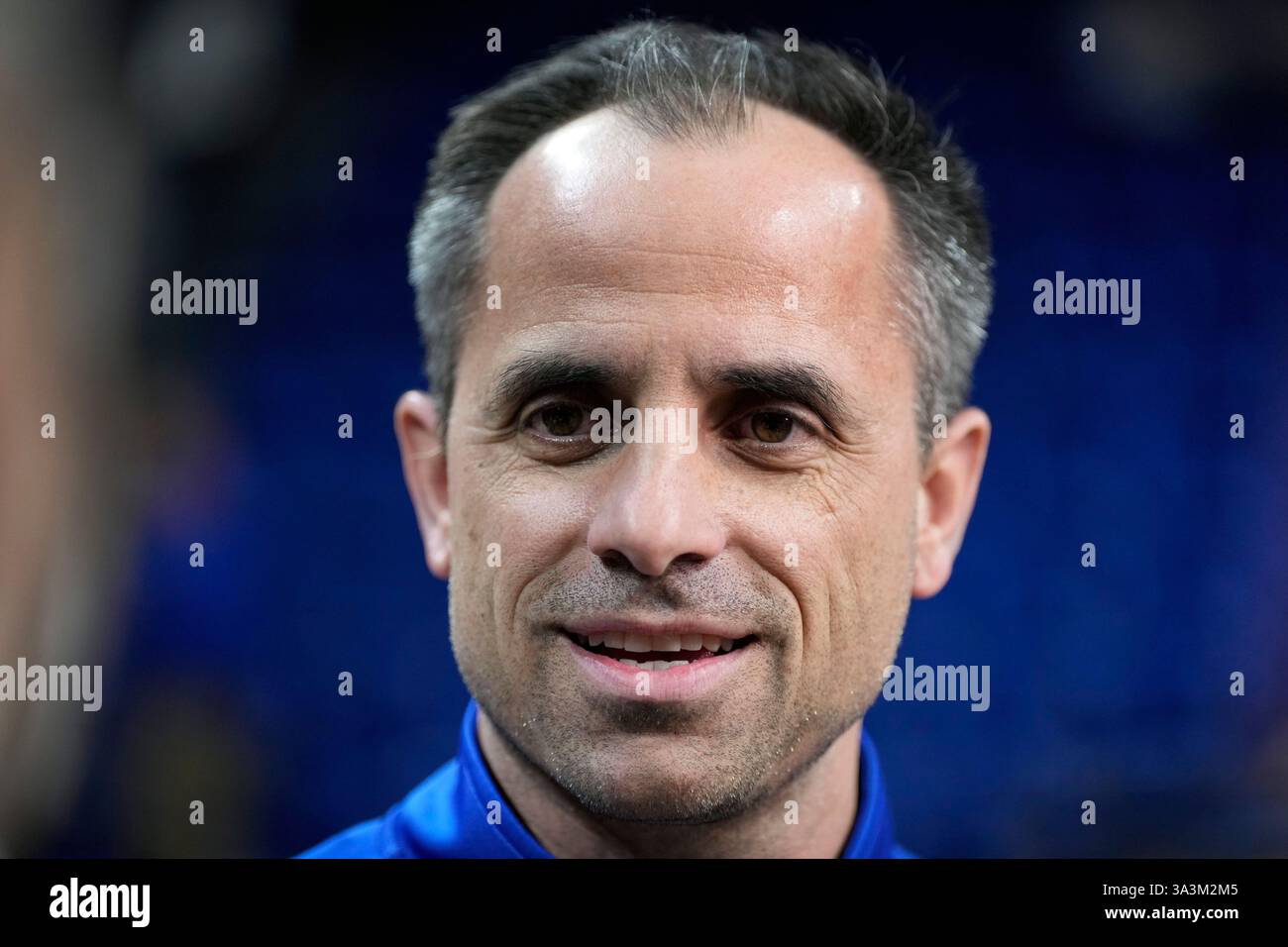 Drake head coach Ben McCollum is interviewed after watching the ...