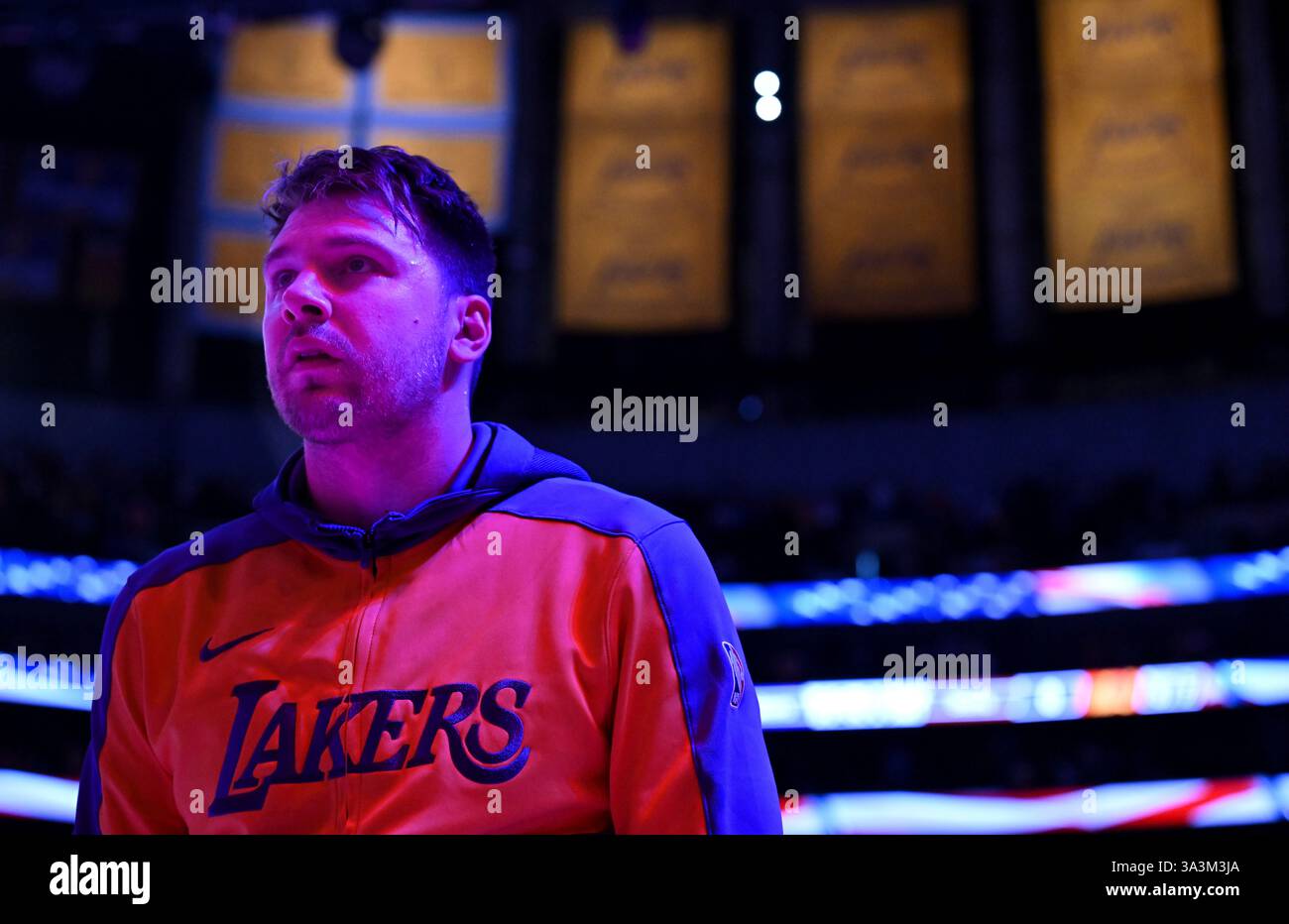 Los Angeles Lakers guard Luka Doncic stands during the national anthem ...