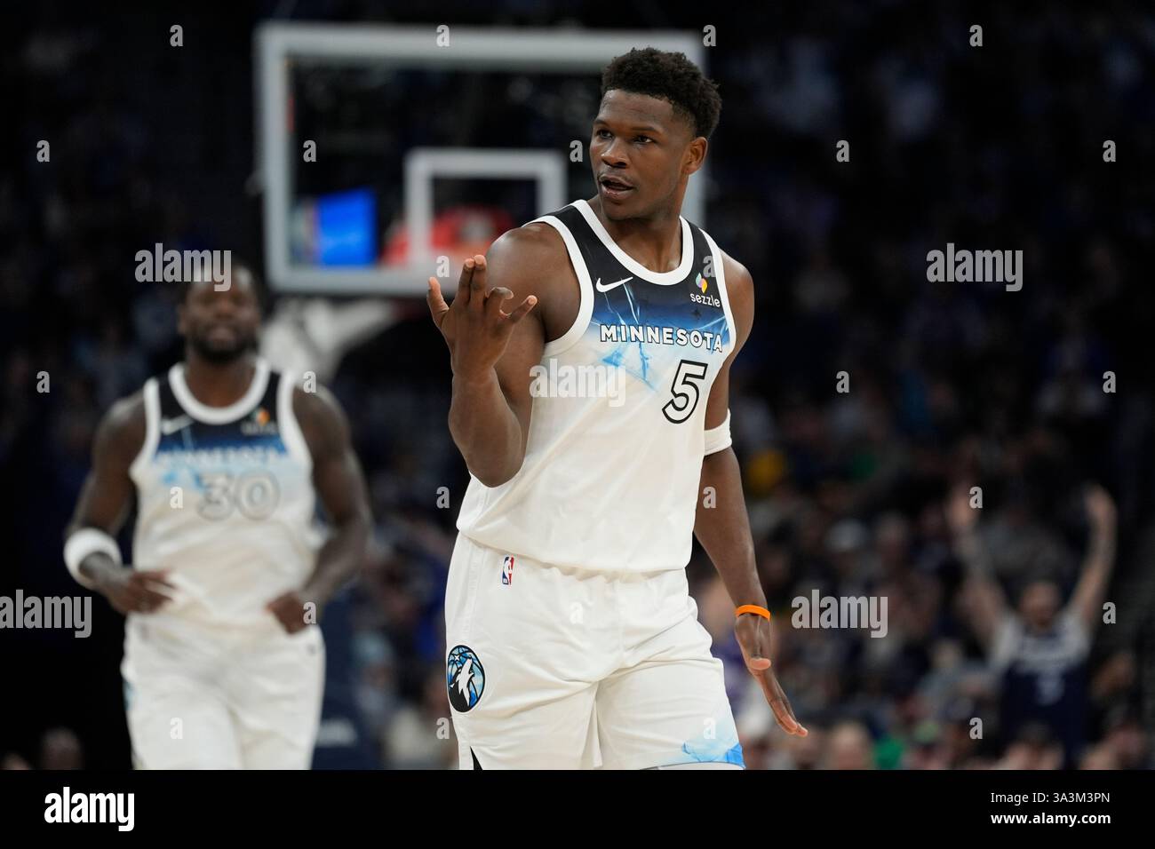 Minnesota Timberwolves guard Anthony Edwards (5) gestures after making ...