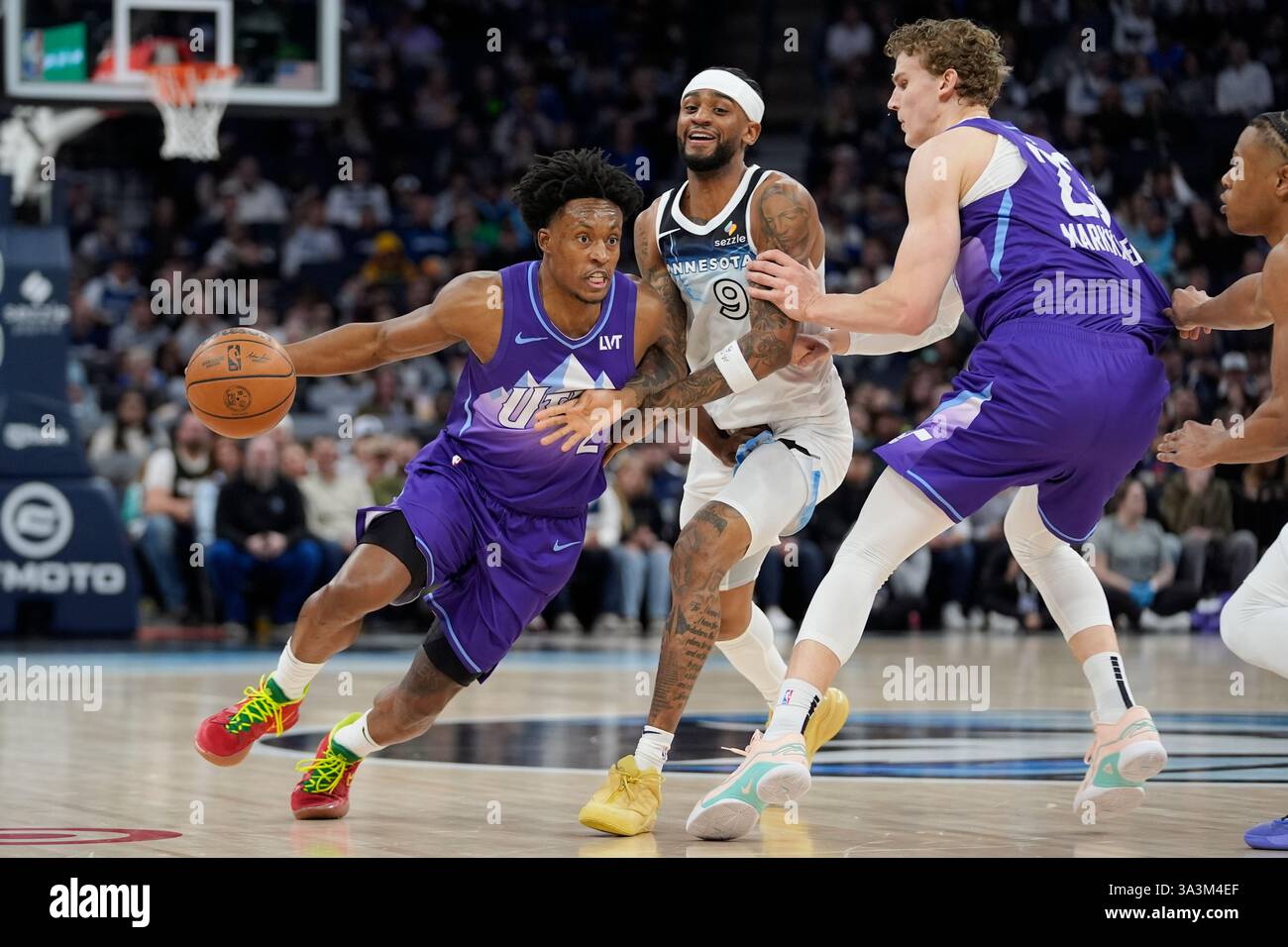 Utah Jazz guard Collin Sexton (2) works toward the basket as Minnesota ...