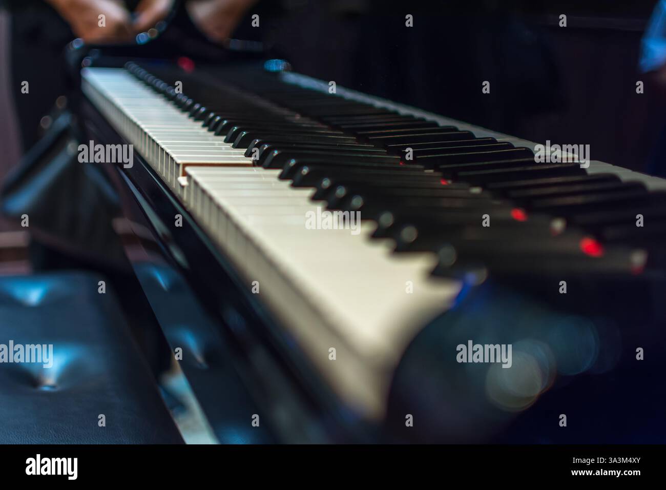 Piano keys on black classical grand piano play a classic song Stock ...