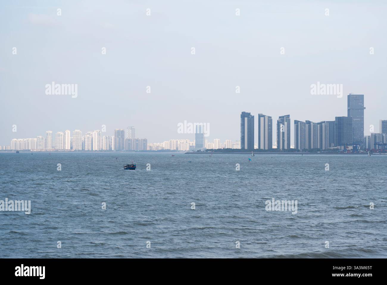 Haikou holiday beach view and city skyline in Haikou Hainan China Stock ...