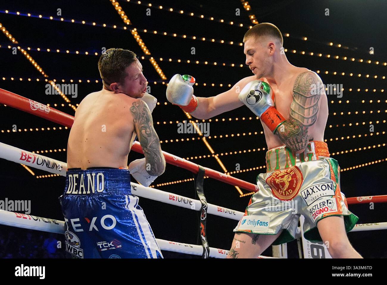 Ireland's Callum Walsh, right, punches Scotland's Dean Sutherland ...