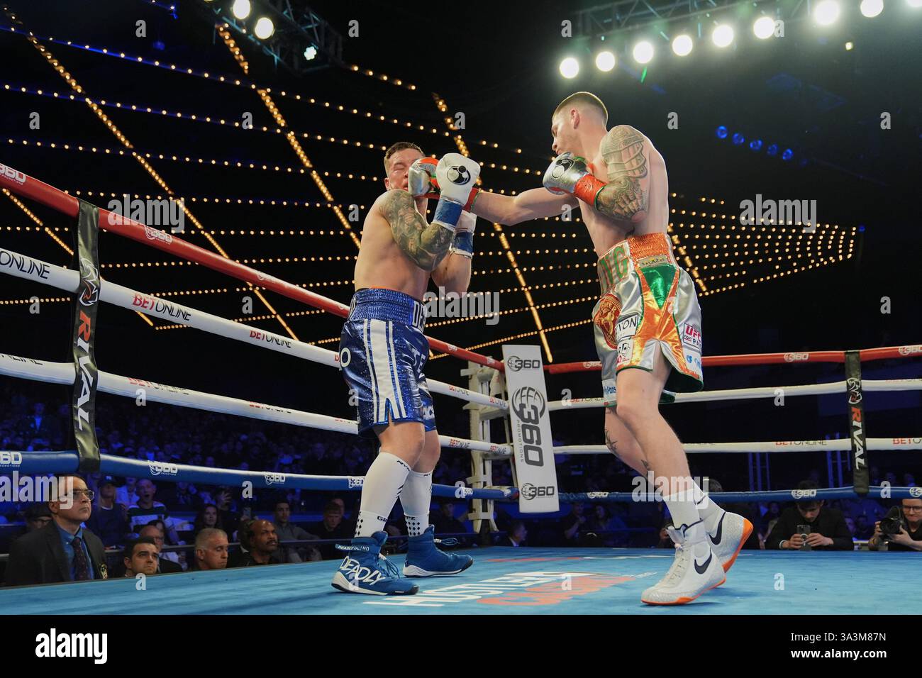 Ireland's Callum Walsh, right, punches Scotland's Dean Sutherland ...