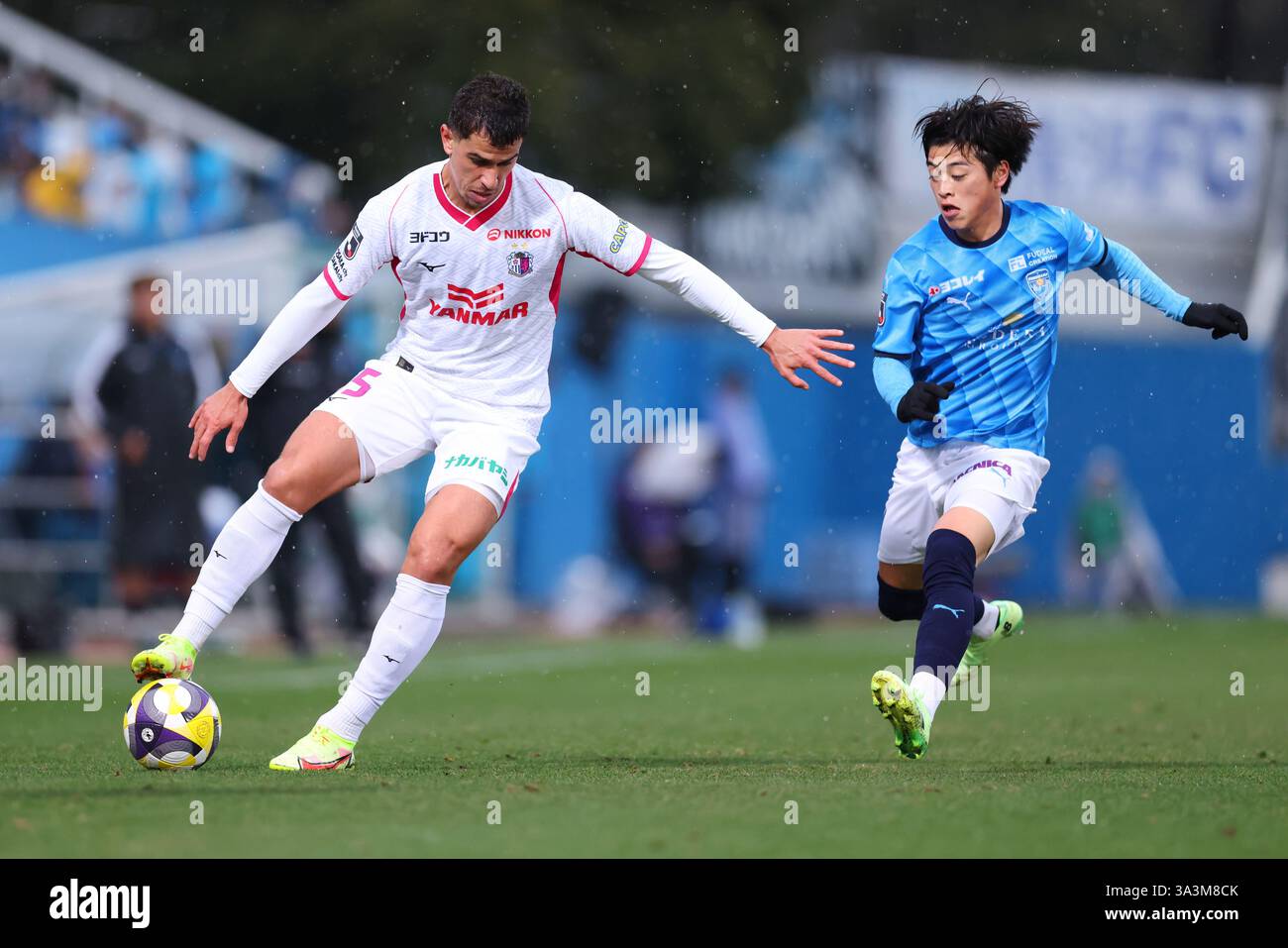 Kanagawa, Japan. 15th Mar, 2025. (L to R) Vitor Bueno (Cerezo), Mizuki Arai (Yokohama FC ...