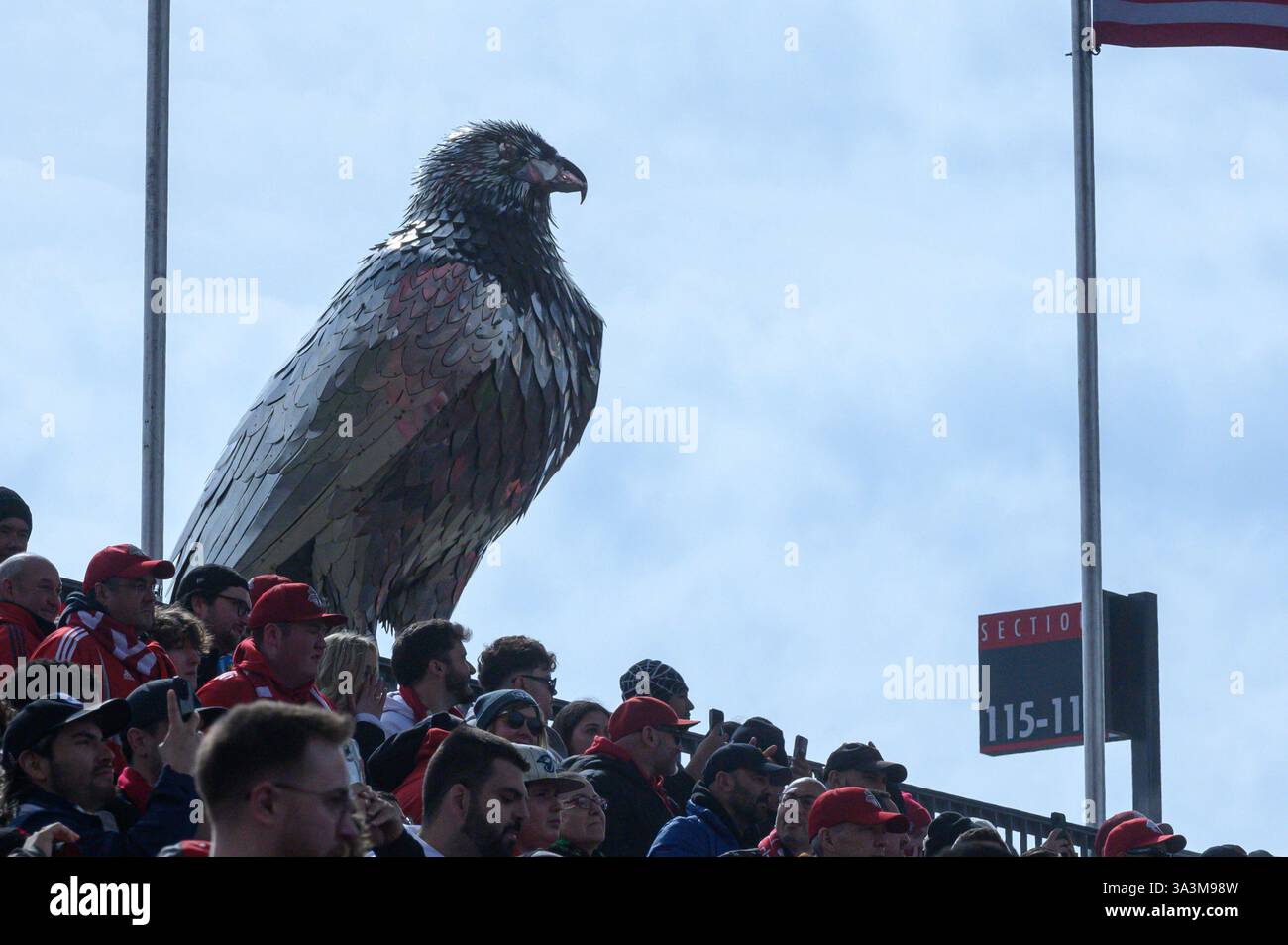 Toronto, ON, Canada - March 15, 2025: A giant metal statue of a Hawk ...