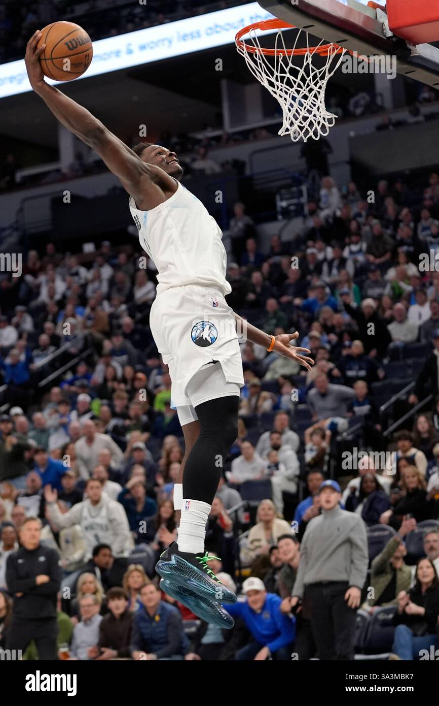 Minnesota Timberwolves guard Anthony Edwards (5) goes up for a dunk ...