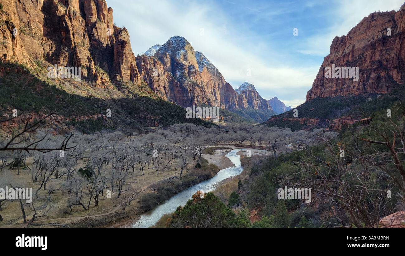 Virgin River flowing through Zion Canyon as the sun rises above the ...