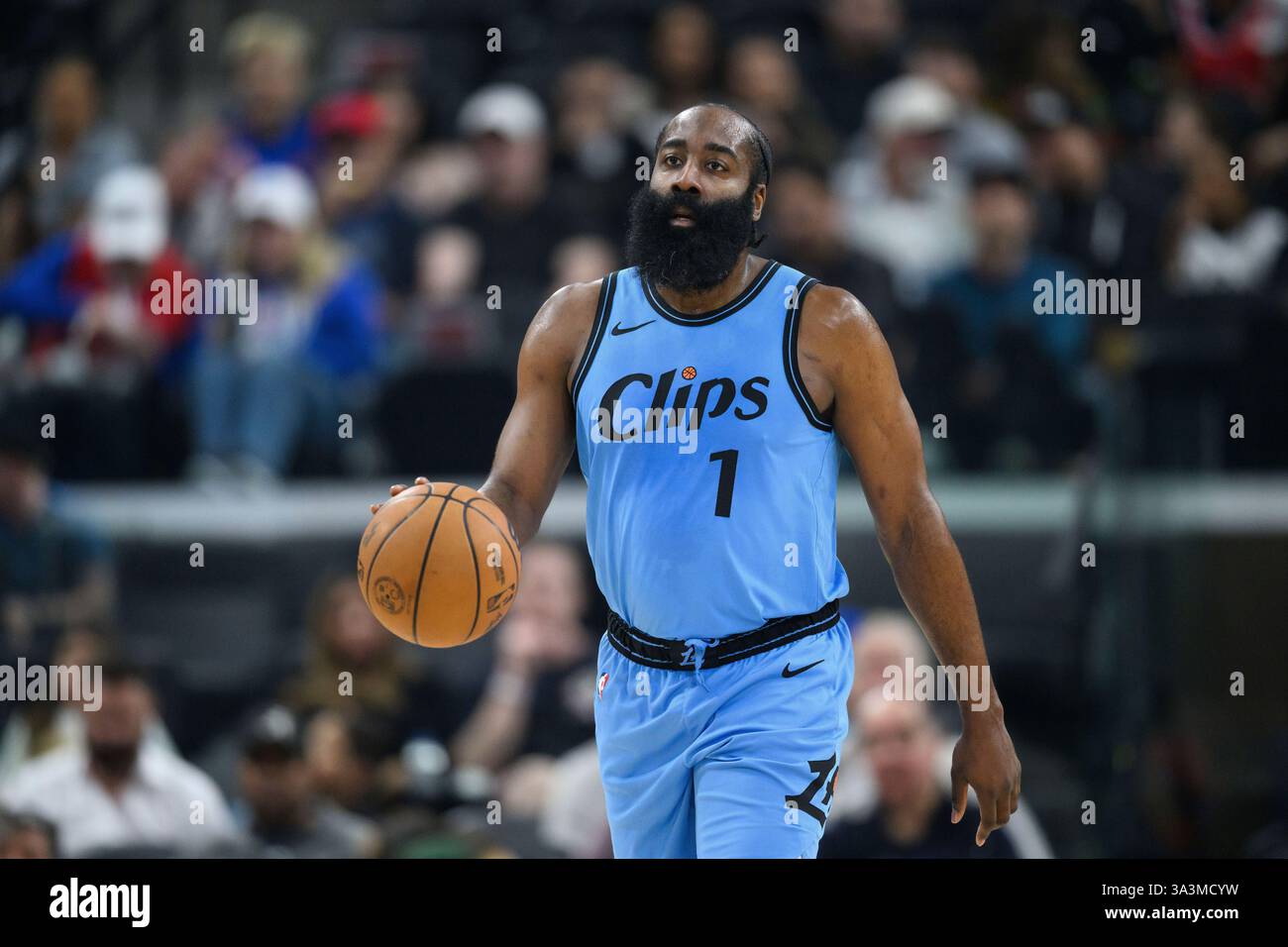 Los Angeles Clippers guard James Harden controls the ball during the ...