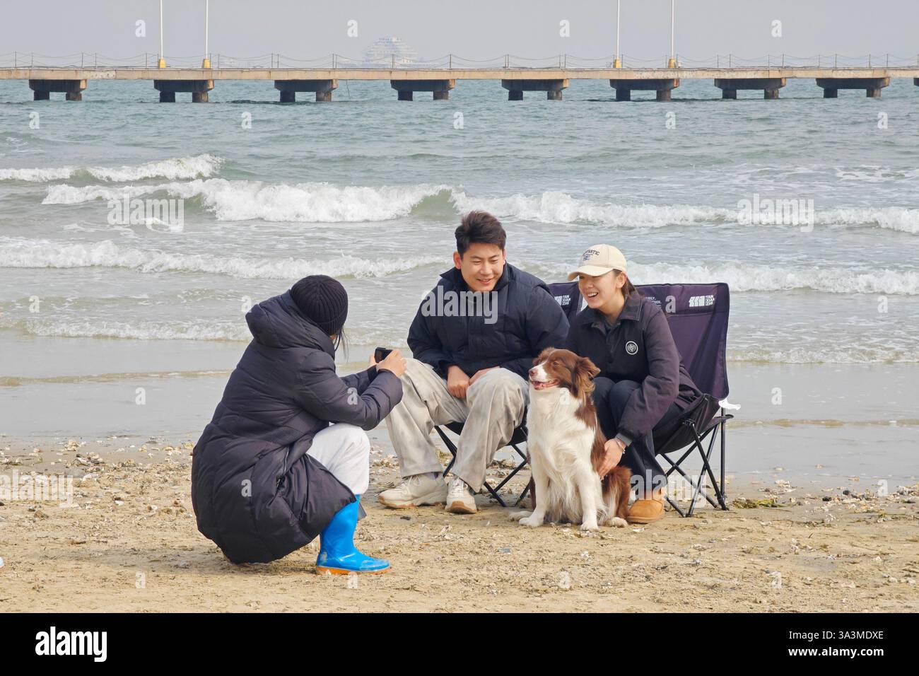 YANTAI, CHINA - JANUARY 11, 2025 - Residents pose for a photo with ...