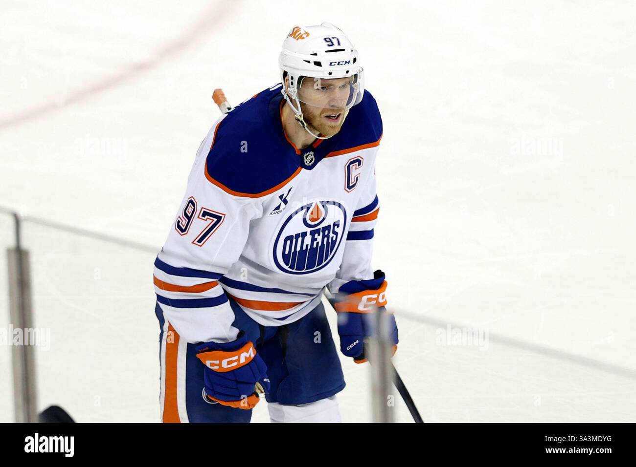 Edmonton Oilers' Connor McDavid skates on the ice after scoring during ...