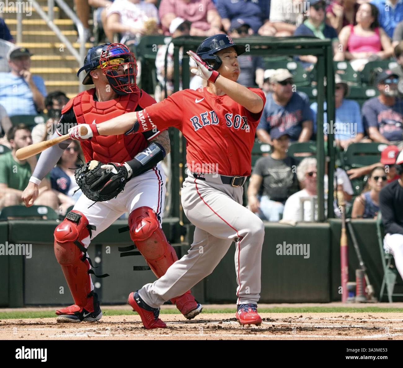 Masataka Yoshida of the Boston Red Sox hits a single in the first ...