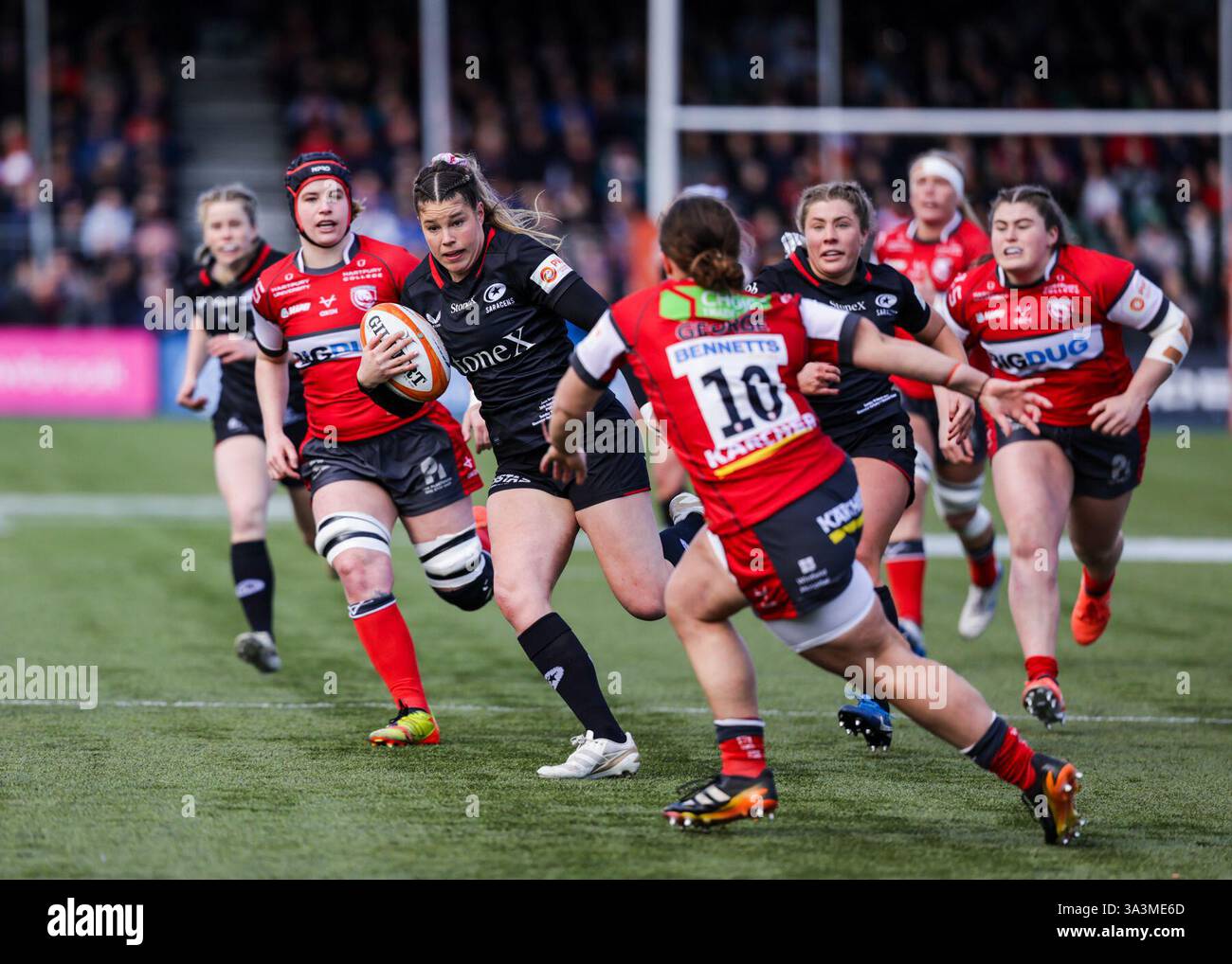 London, UK. 16th March 2025. Jess Breach (Saracens) with ball as Lleucu ...