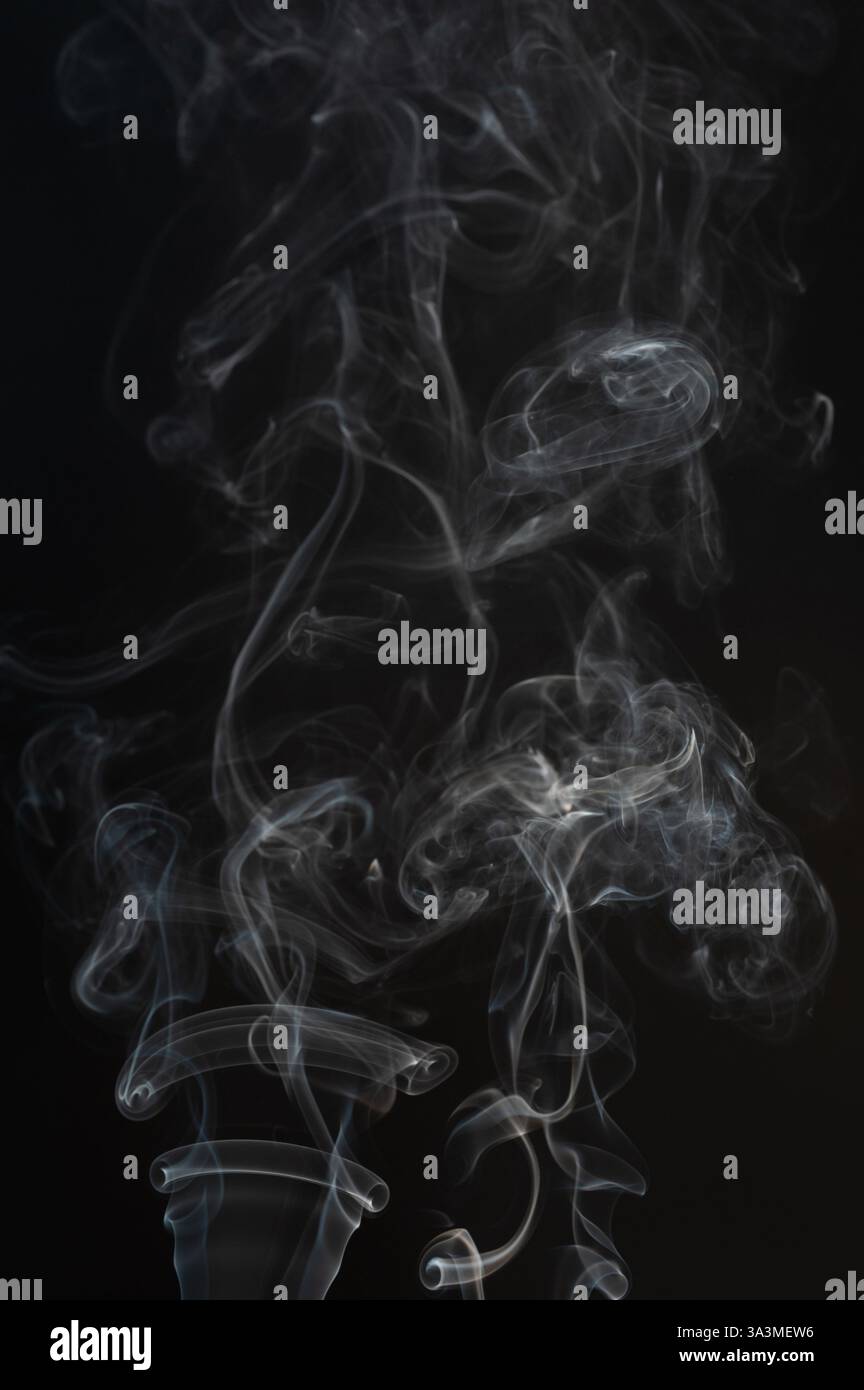 Clean white smoke flow effect on black studio background Stock Photo ...