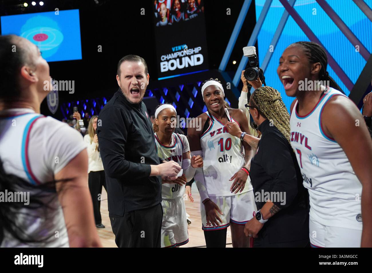 Vinyl players and team staff celebrate defeating the Lunar Owls in ...