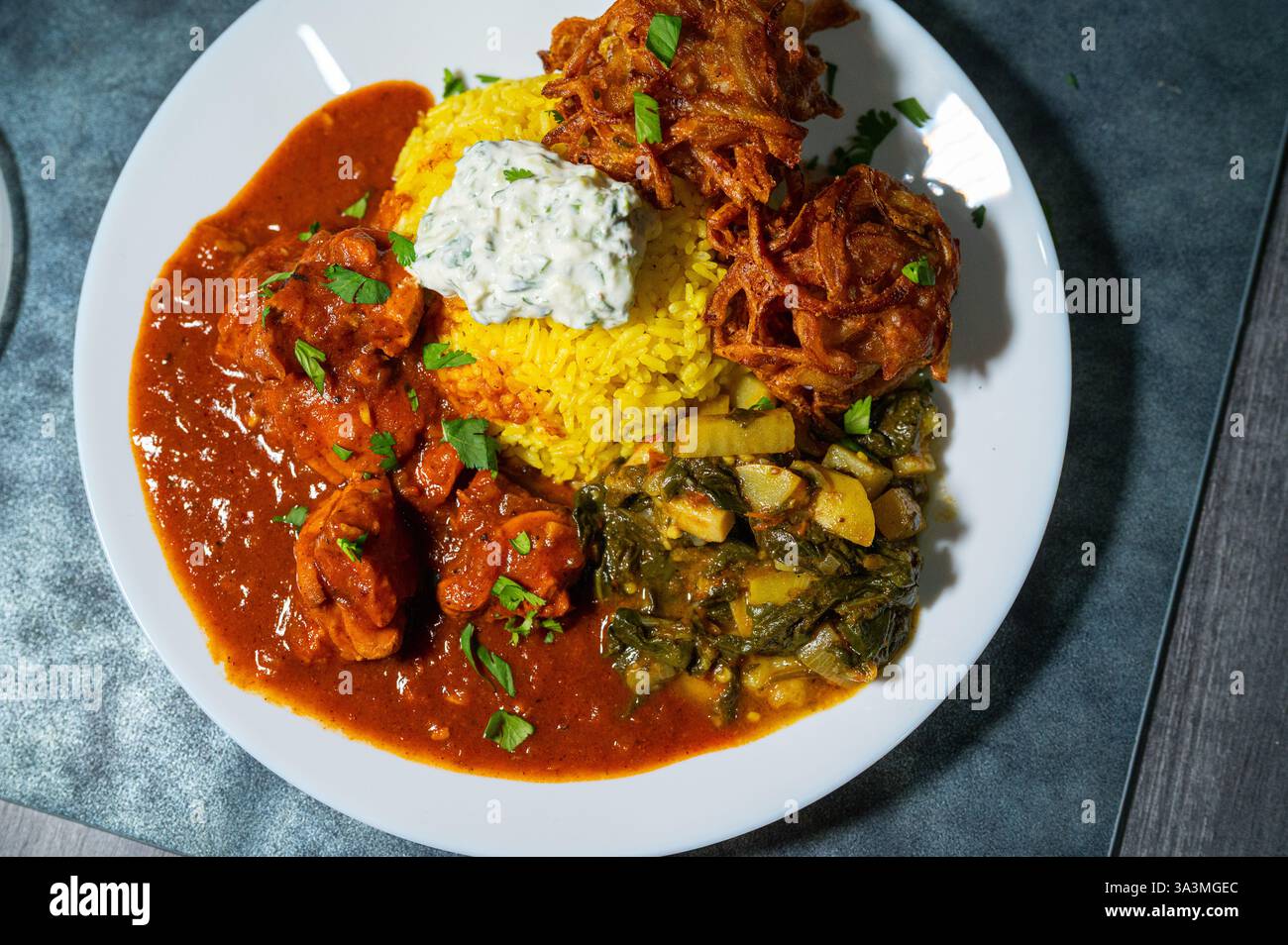 Indian butter chicken, also known as Murgh Makhani. Colorful curry dish ...