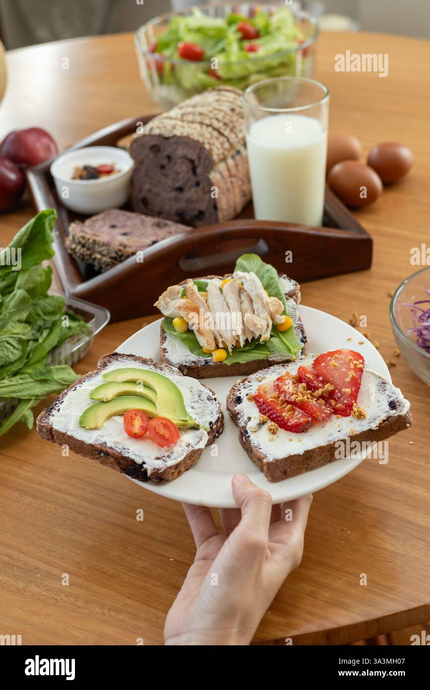 A romantic and elegant dish featuring three toasts with a smooth layer ...