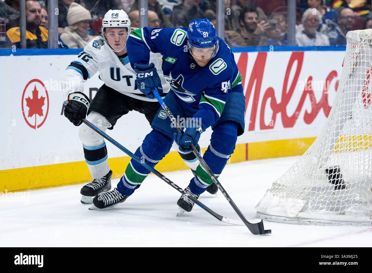 Utah Hockey Club's Logan Cooley (92) and Vancouver Canucks' Dakota ...